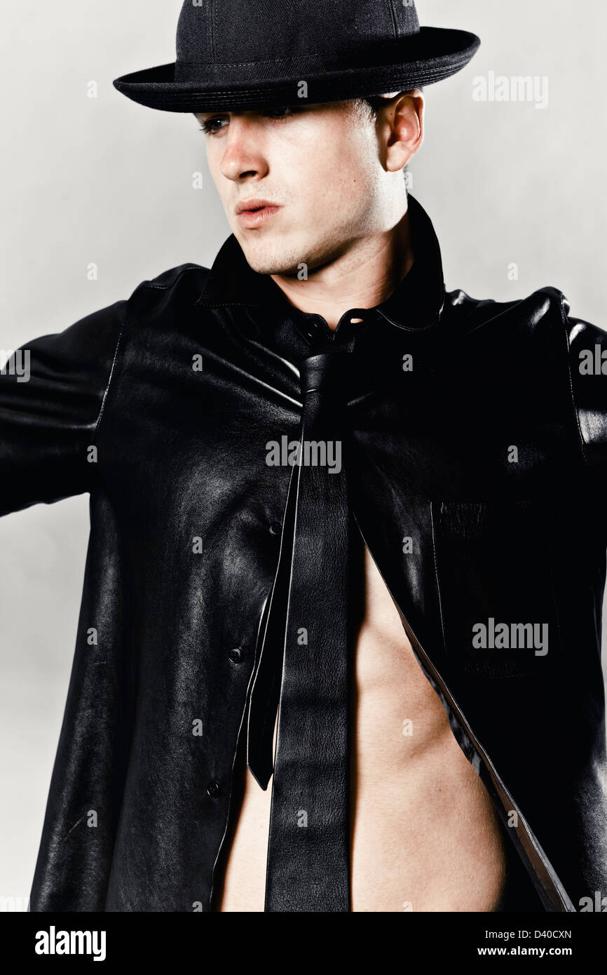 Young caucasian man in men's fashion photo taken in studio Stock Photo ...