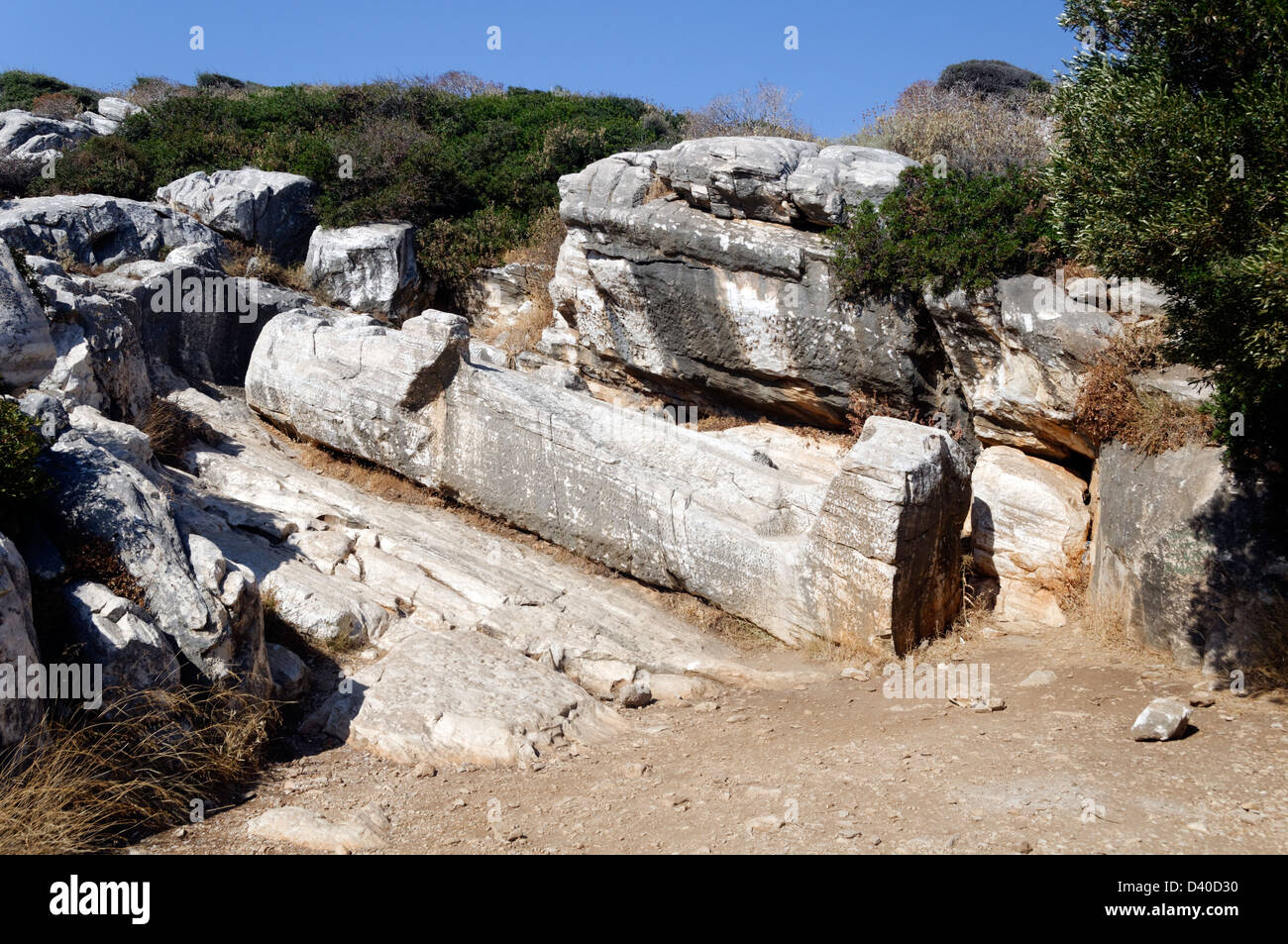 Kouros of Apollon lays abandoned in an ancient marble quarry near the ...