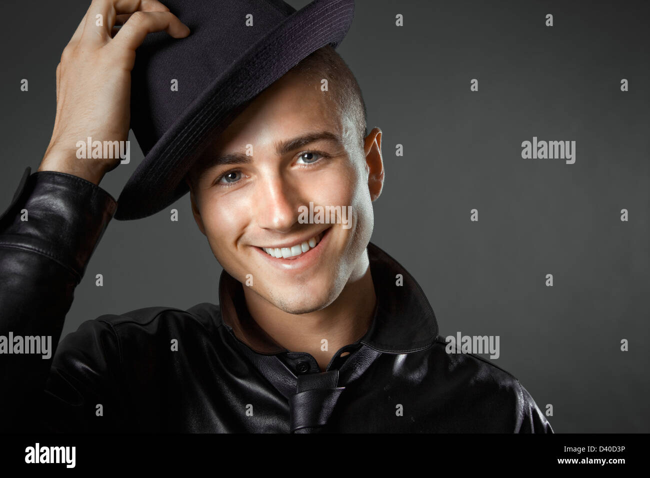 Young caucasian man in men's fashion photo taken in studio Stock Photo ...