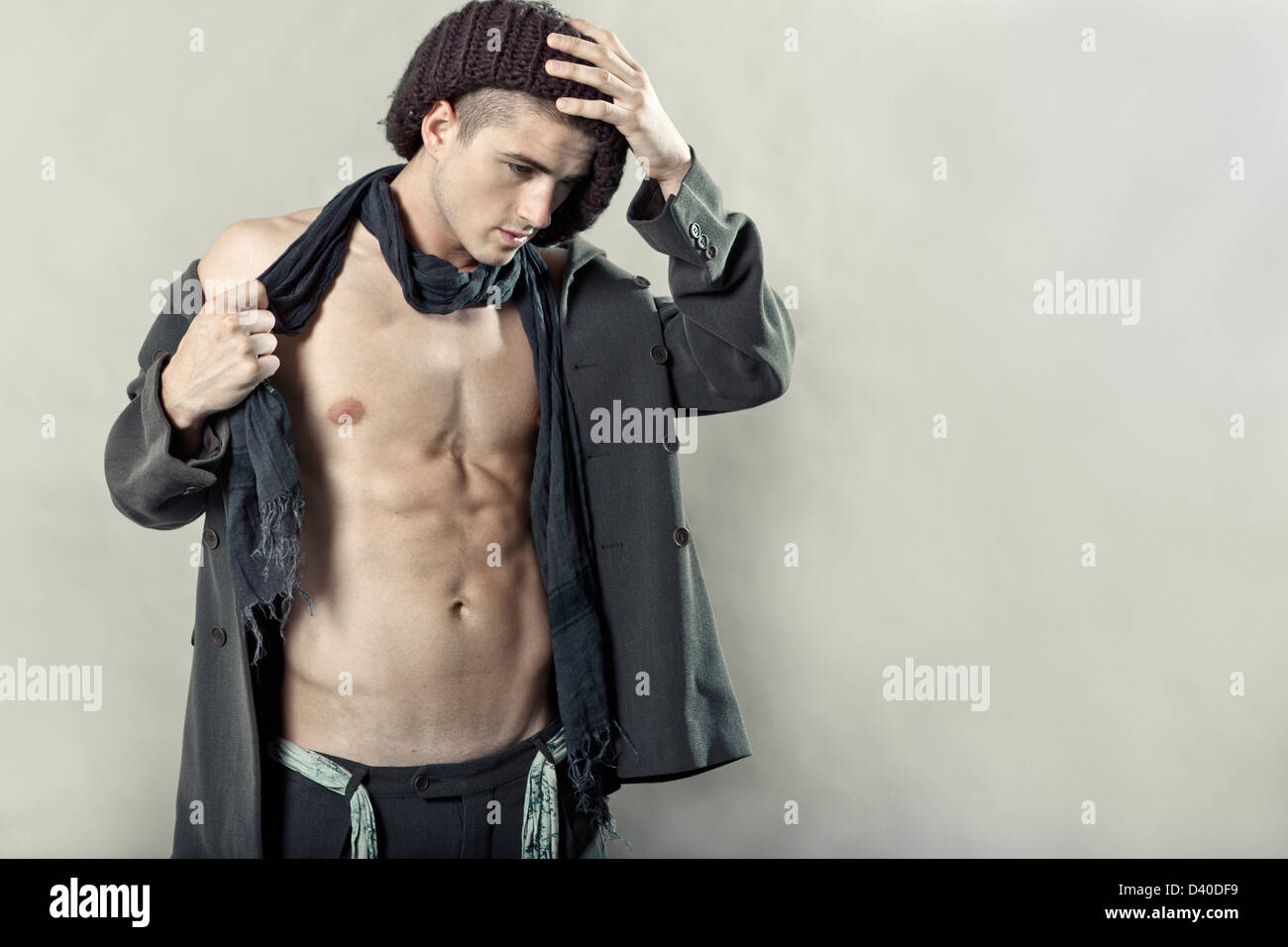 Young caucasian man in men's fashion photo taken in studio Stock Photo ...