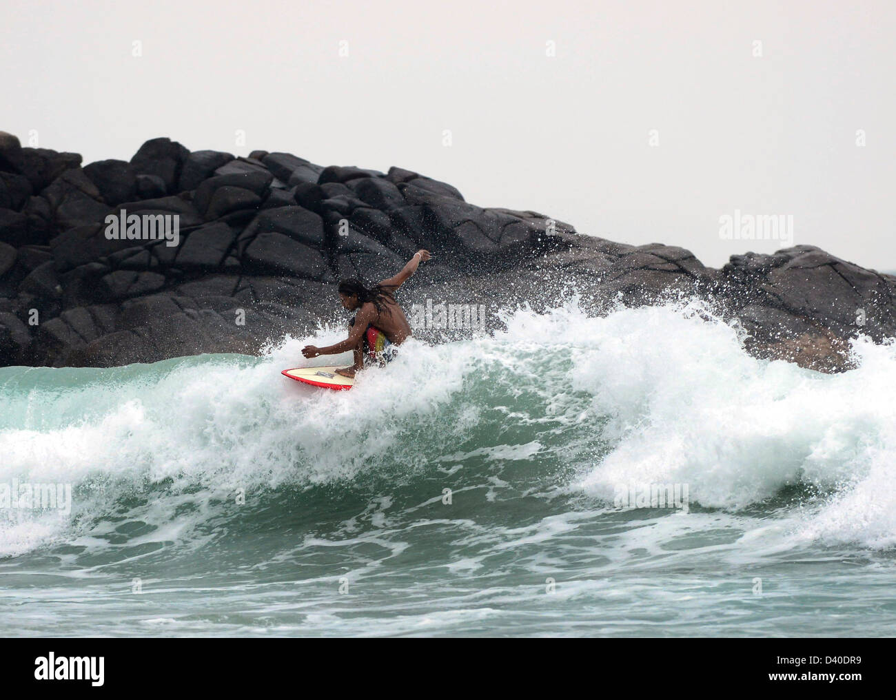 Surfing the waves in Mirissa, Sri Lanka Stock Photo - Alamy