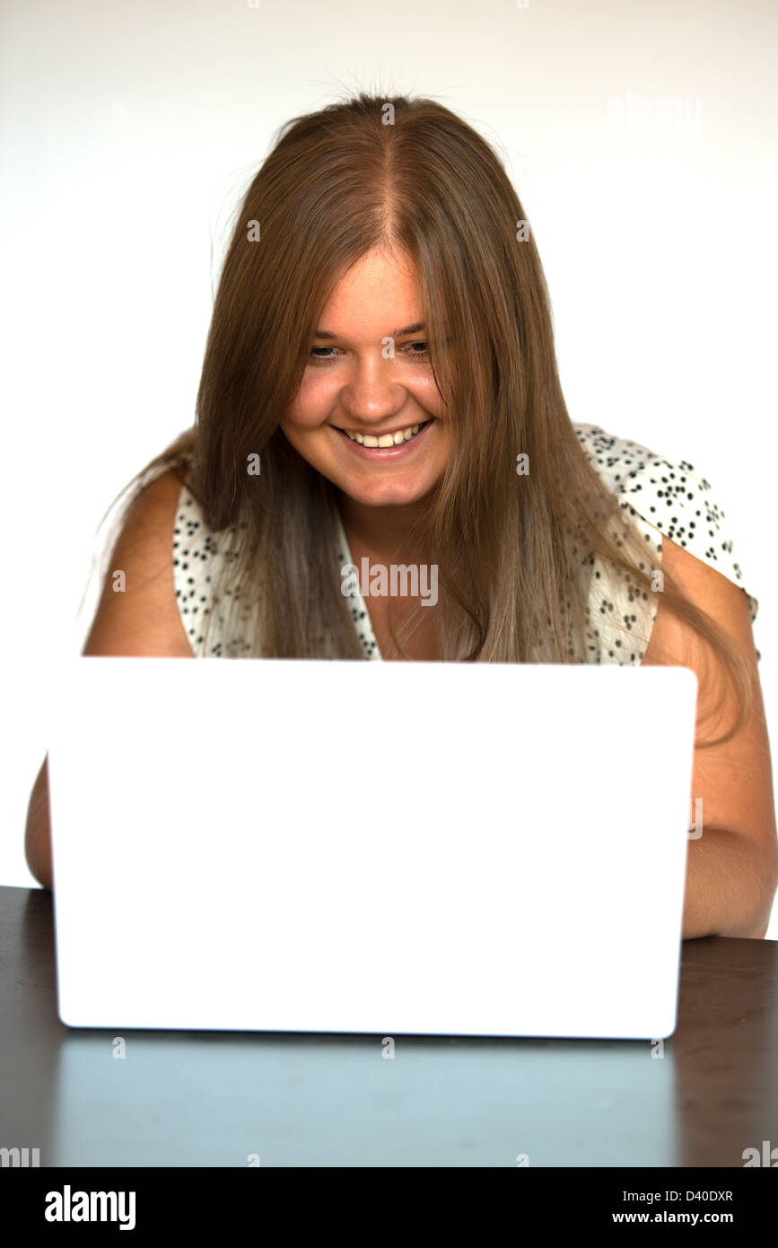 pretty blond girl with white laptop computer Stock Photo - Alamy