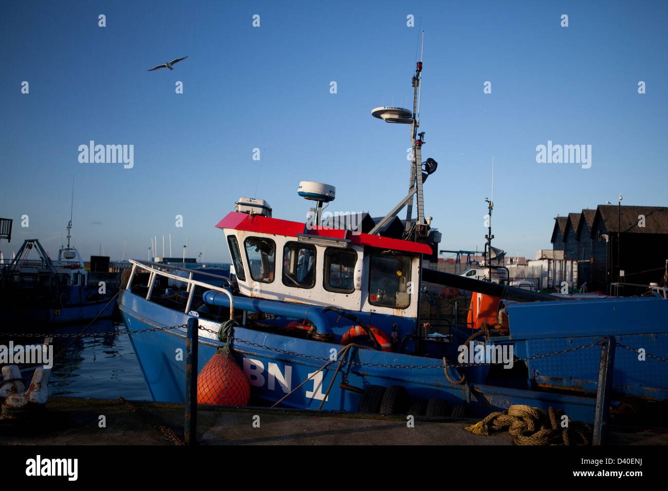 A fishing boat at the seaside town of Whitstable, Whitstable Harbour in ...