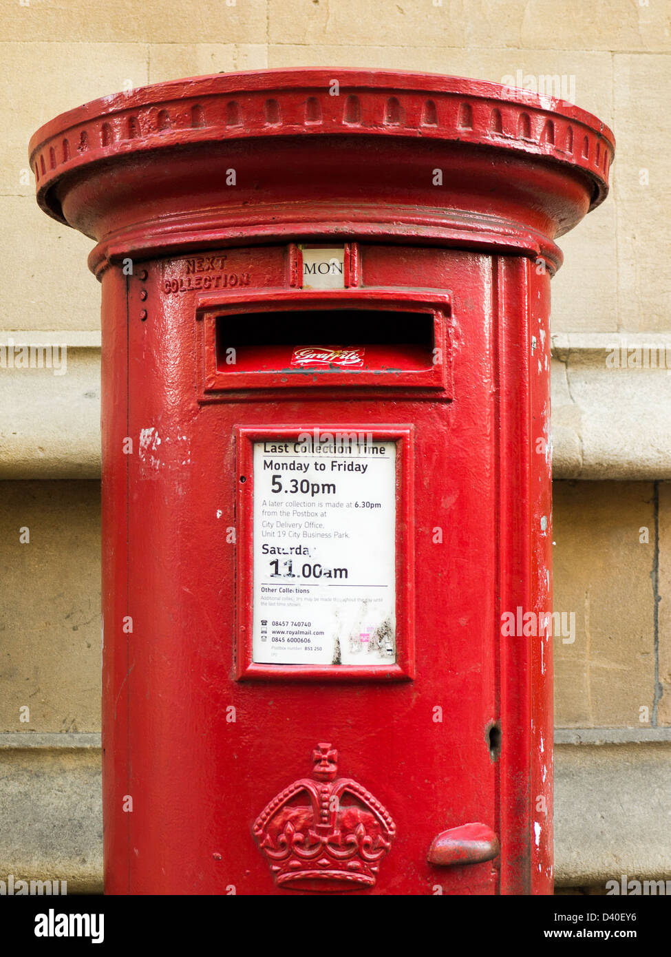 A red pillar box in the city of Bristol Stock Photo - Alamy