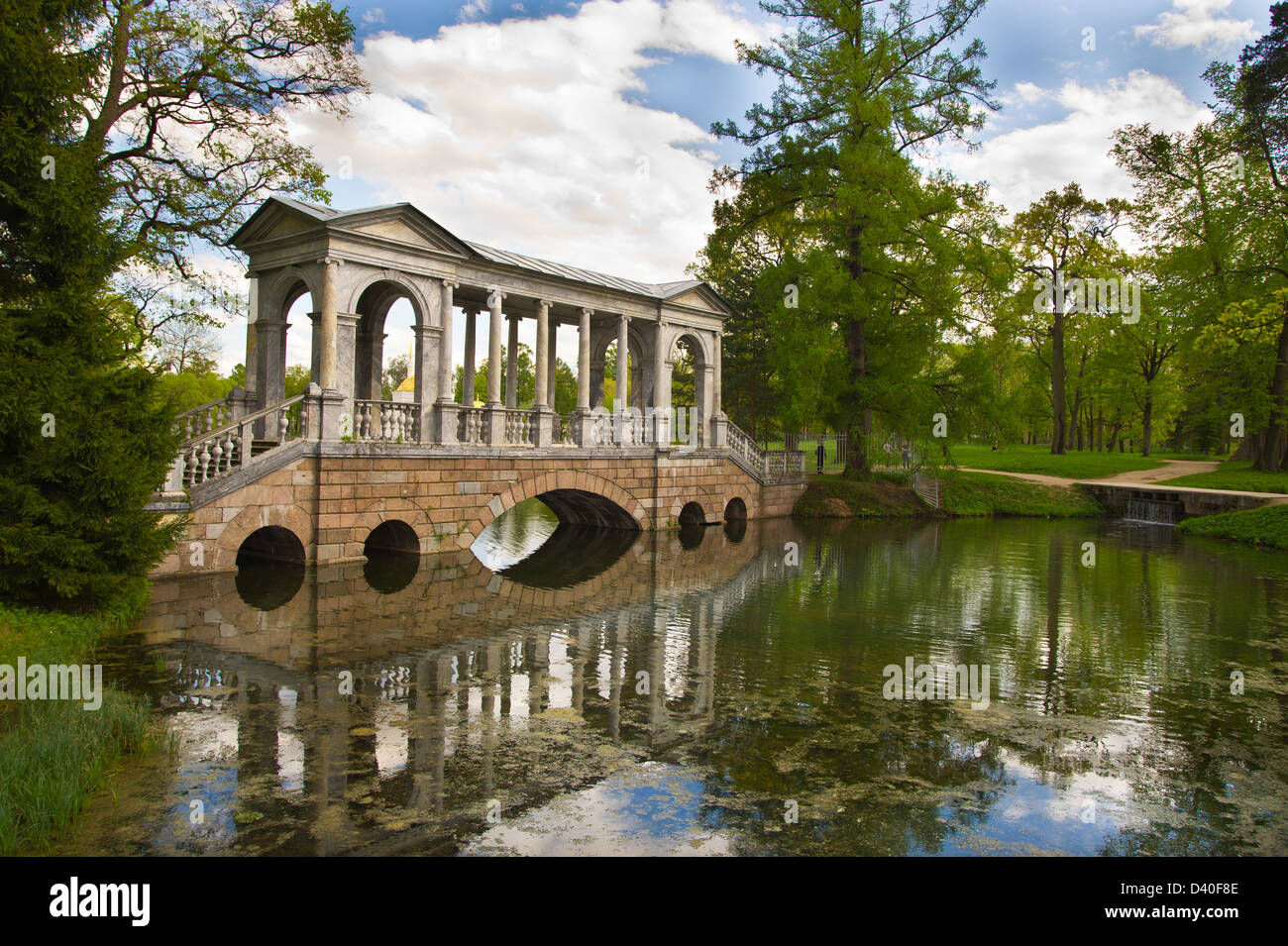 A beautiful old bridge across the lake Stock Photo - Alamy