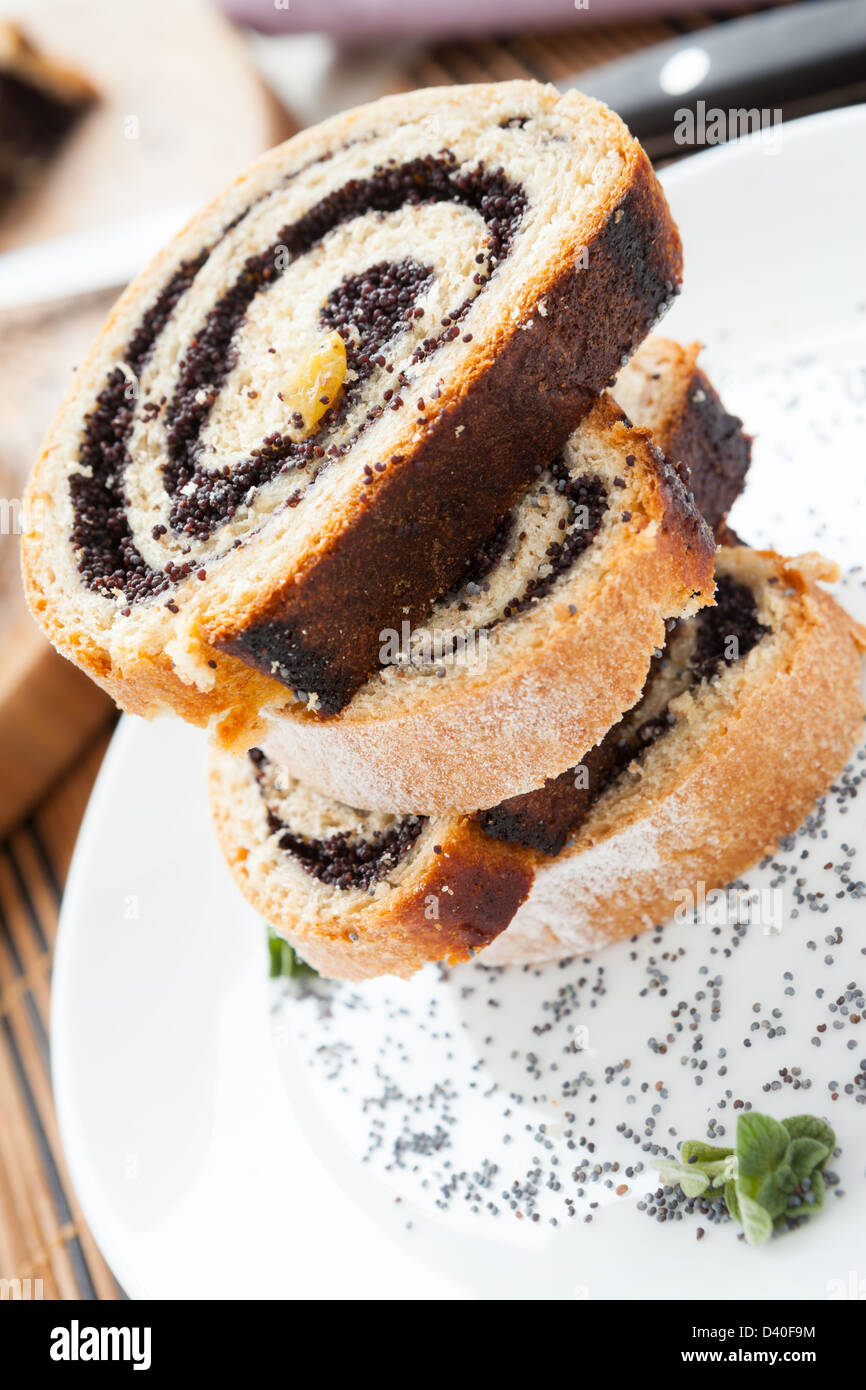 stack of pieces of poppy rolls, closeup Stock Photo - Alamy