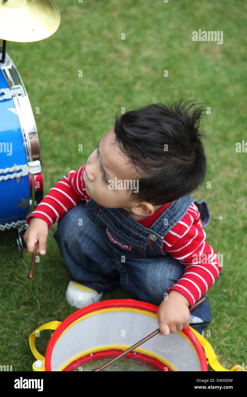 Black child playing an instrument High Resolution Stock Photography and ...