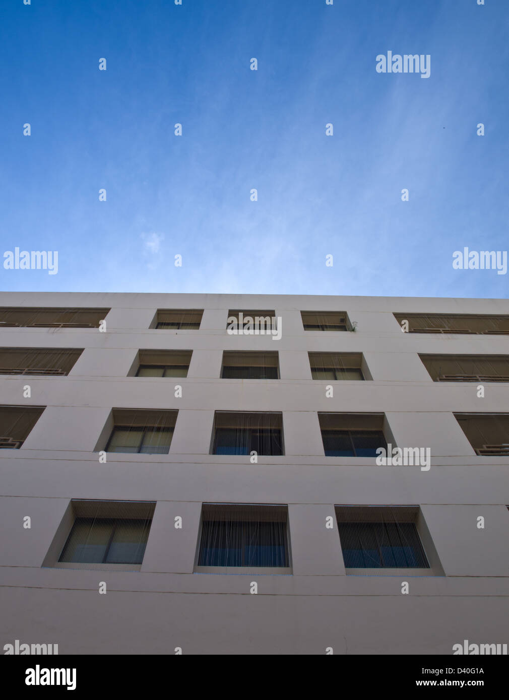 Facade windows of office building on blue sky Stock Photo - Alamy