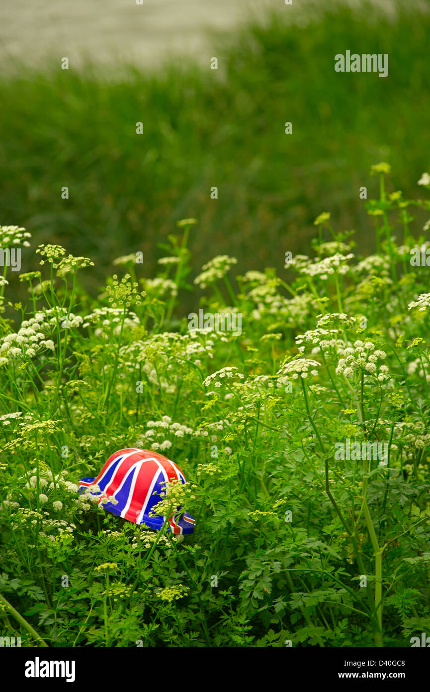 Discarded Union Jack bowler hat in shrubbery Stock Photo - Alamy