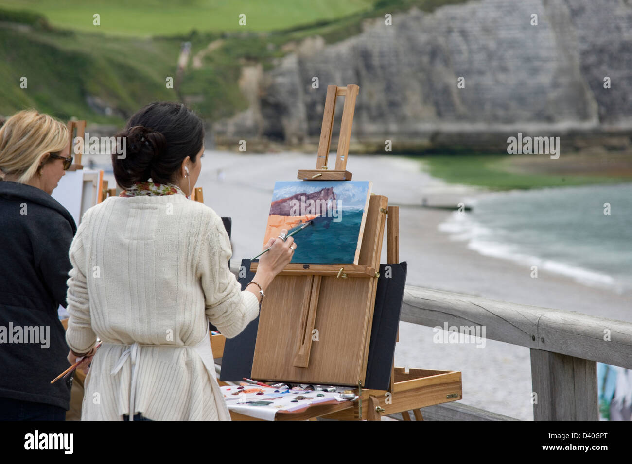 Artist painting on the promenade at Etretat in Normandy France Stock ...