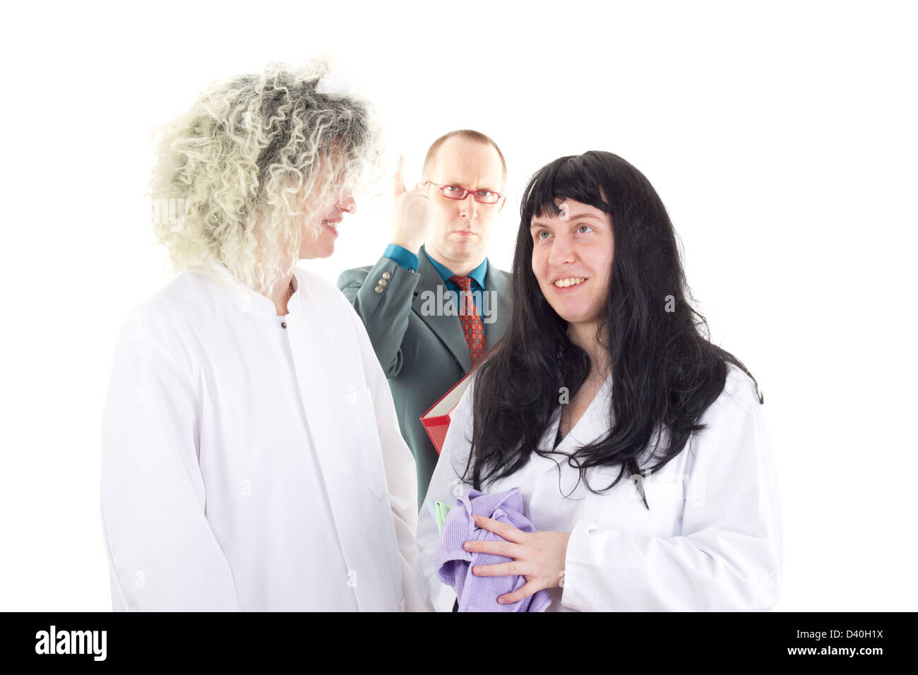Female cleaners in white work coats with supervisor Stock Photo - Alamy