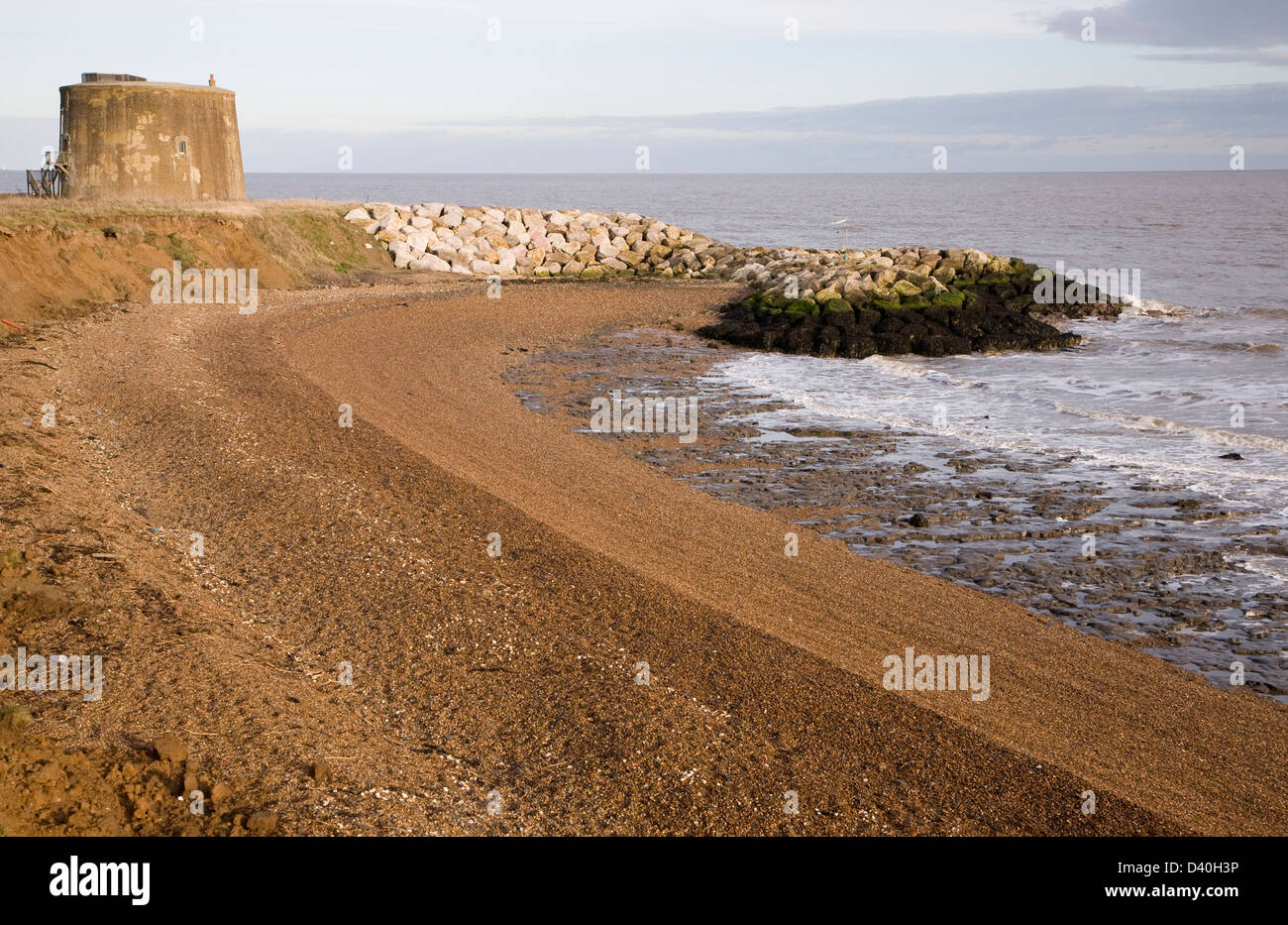 Rapidly eroding cliff of soft Red Crag rock at East Lane, Bawdsey ...