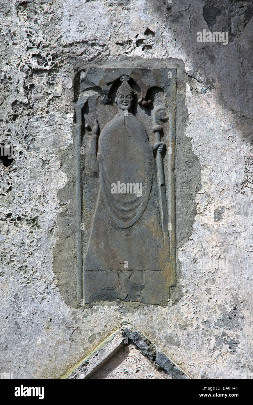 Stone Carving of A Bishop on a wall inside Corcomroe Abbey, 13th ...
