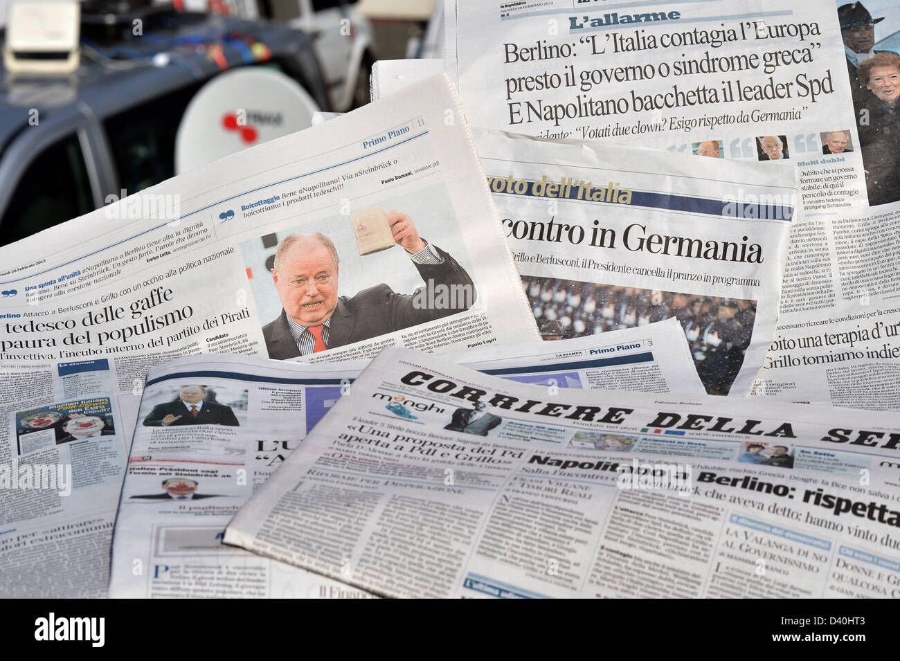 Italian newspapers are on display reporting on SPD chancellor Peer ...