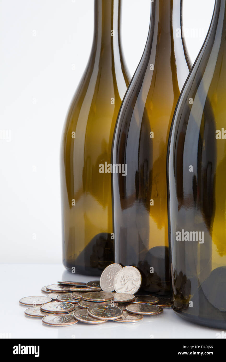 Three empty bottles of wine Stock Photo - Alamy