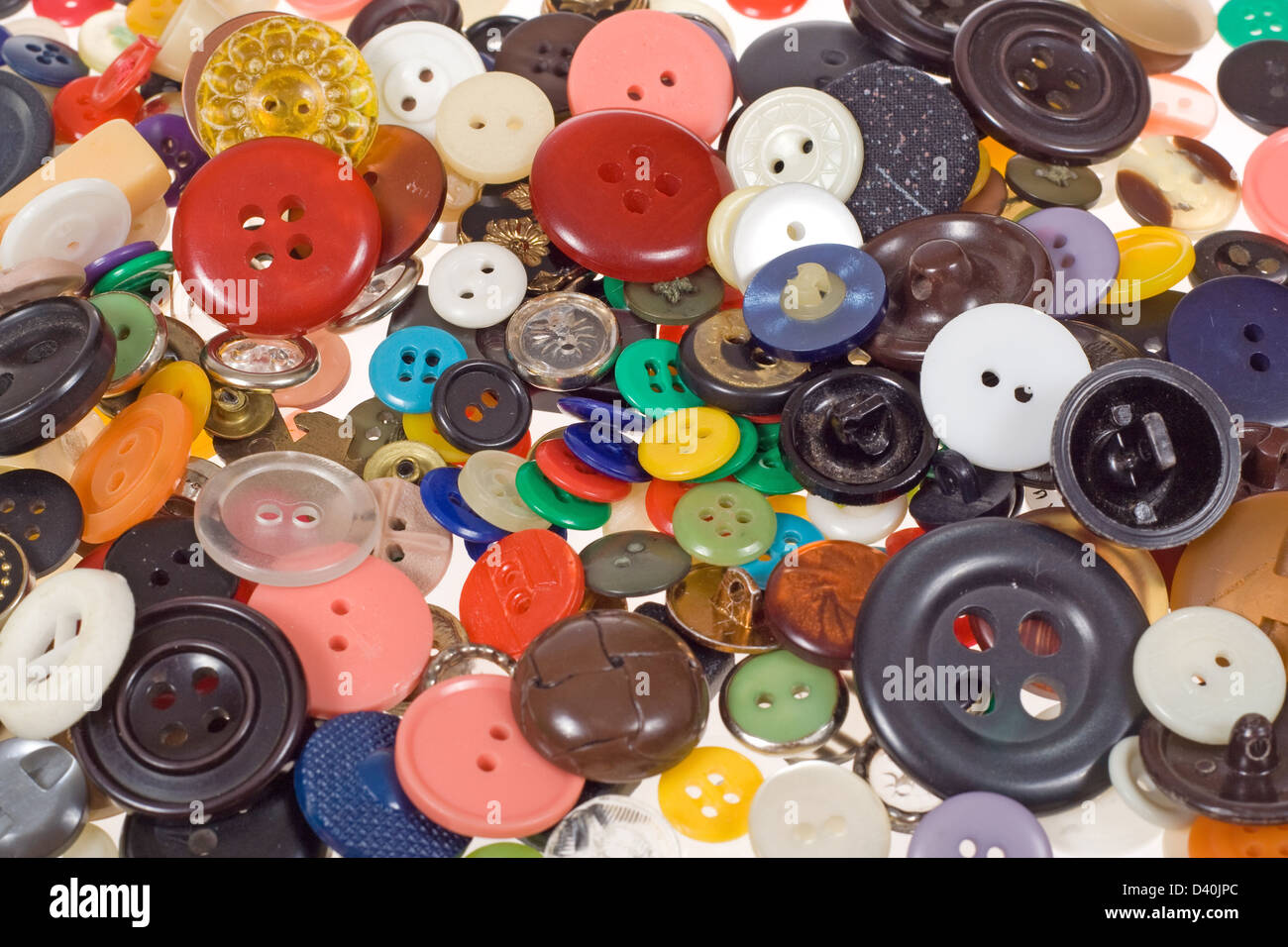many different sized and shaped buttons Stock Photo - Alamy