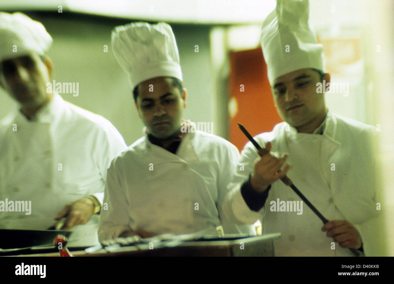 Three Indian chefs in a kitchen Stock Photo - Alamy