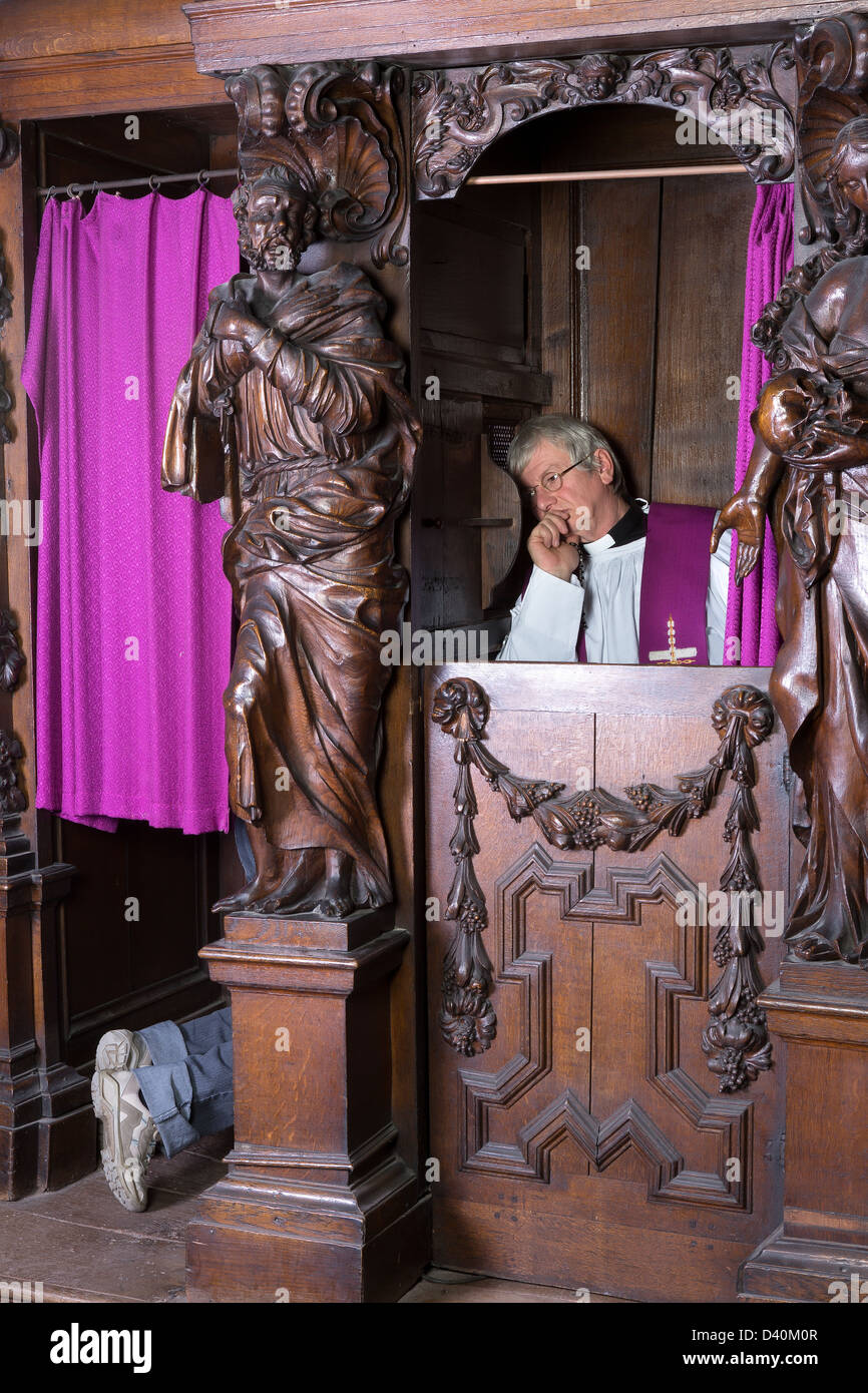 Catholic Priest Confession High Resolution Stock Photography and Images ...