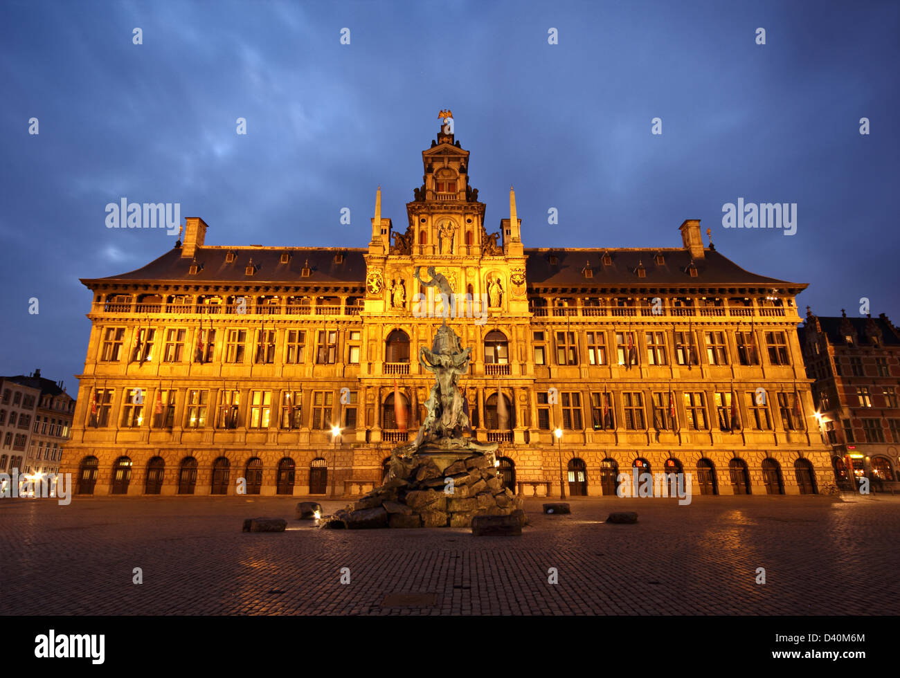Frontal view of Antwerp (Anvers) city hall and statue from Grote Markt ...