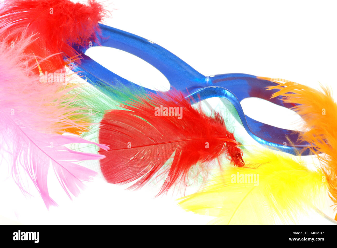 Blue carnival mask and a lot of beautiful colorful feathers Stock Photo ...