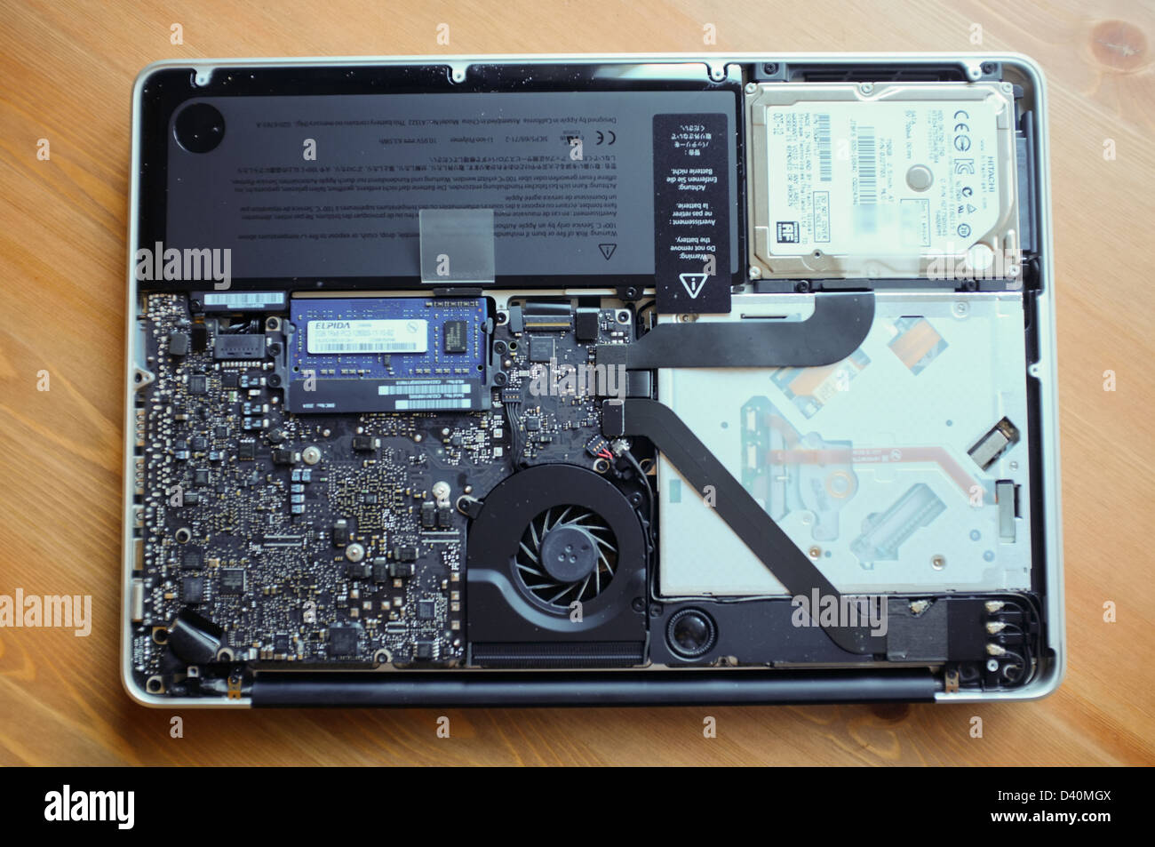 Apple Macbook Pro with base removed, showing internal components ...