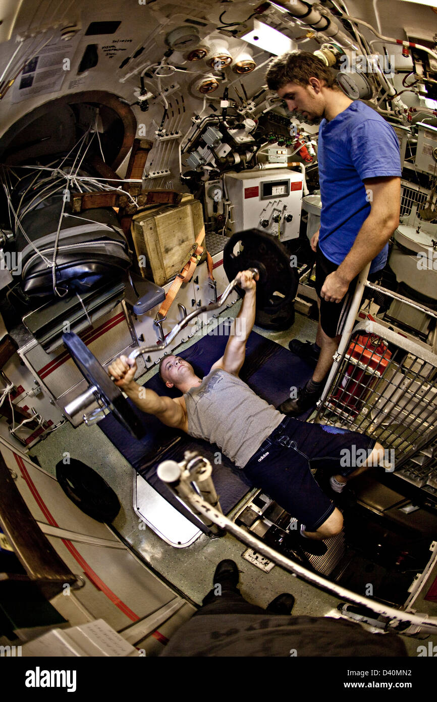 Working out with weights on Nuclear Submarine HMS Talent Stock Photo ...