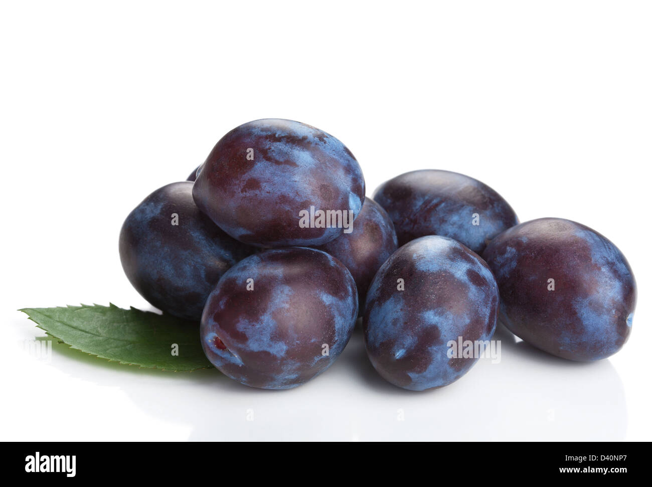 fresh plums isolated Stock Photo - Alamy