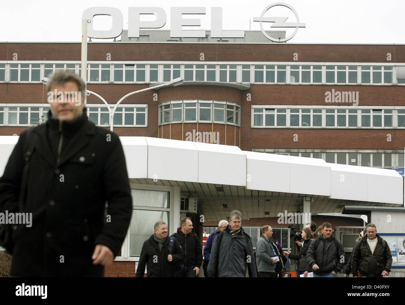 Opel employees leave the factory at Gate 1 in Bochum, Germany, 28 ...