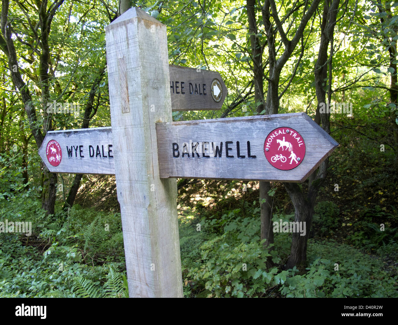 wooden sign post giving directions on monsal trail Stock Photo - Alamy