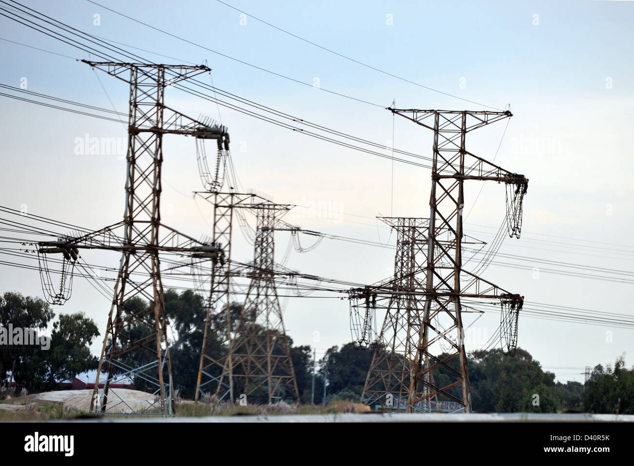 Large pylons carrying electricity cables Stock Photo - Alamy