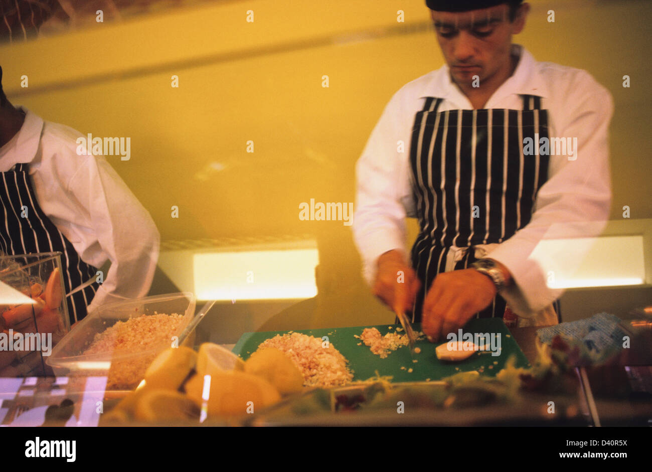 Chefs in a restaurant prepare lunch Stock Photo - Alamy
