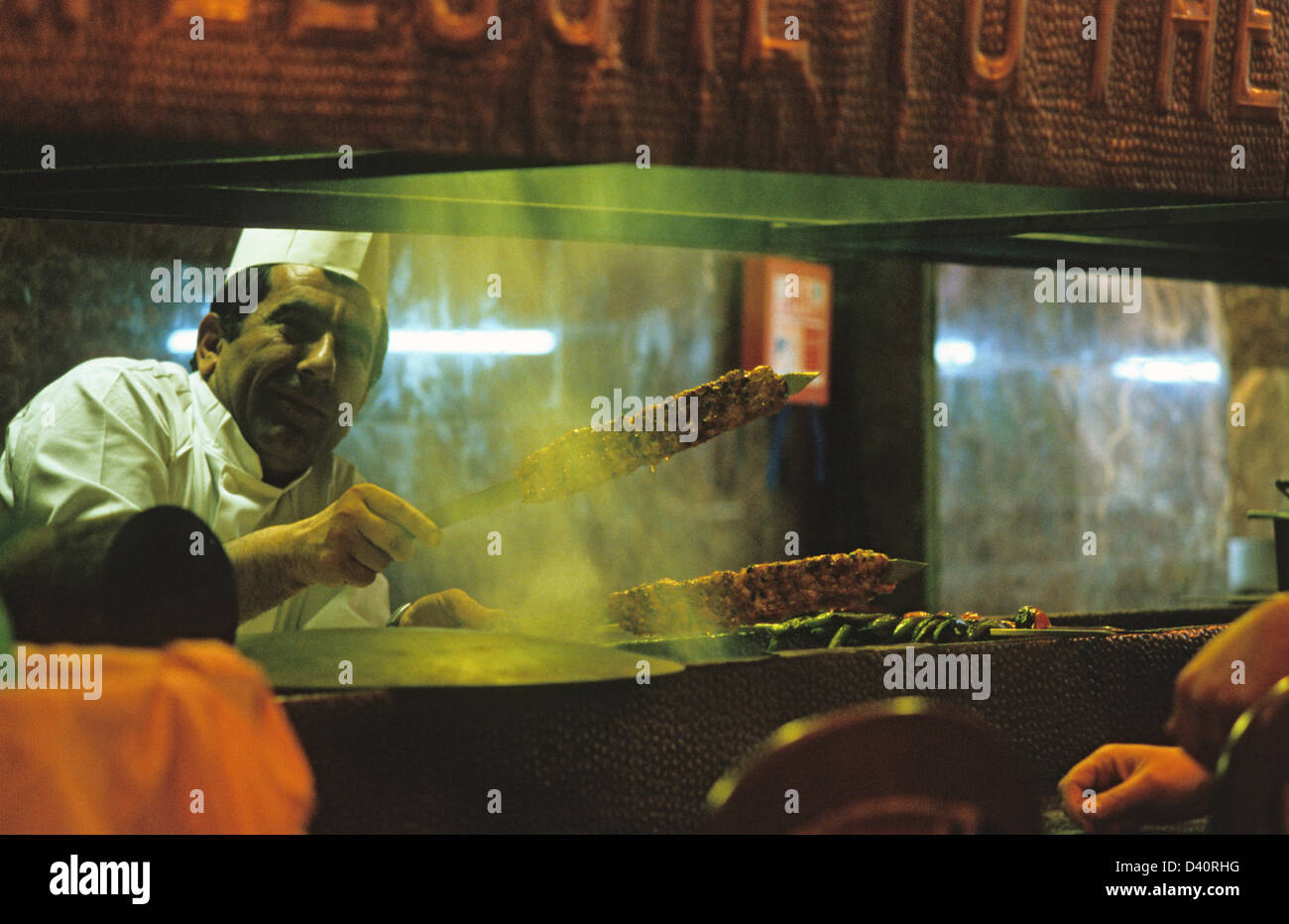 A chef in a Turkish grill Stock Photo - Alamy