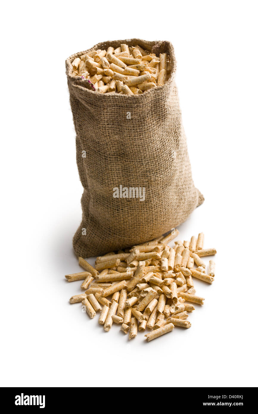 wooden pellets in jute sack on white background Stock Photo - Alamy