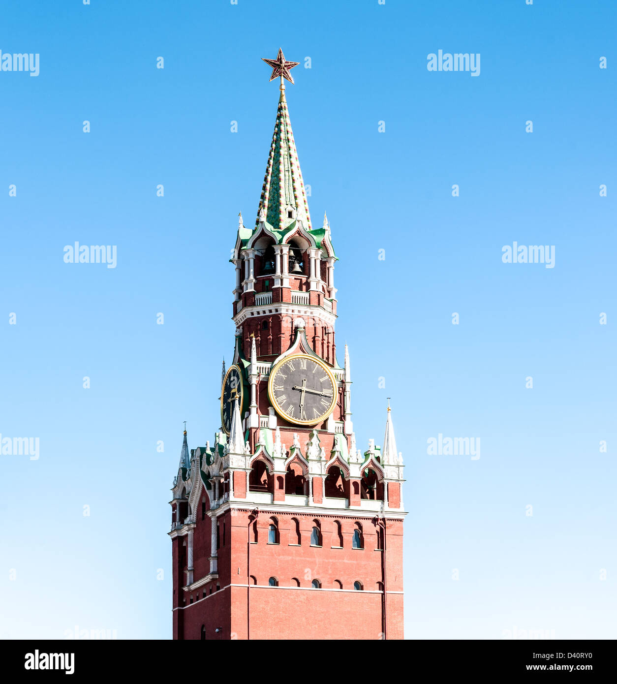 Spasskaya tower of Kremlin with clock and red star. Beautiful old style ...