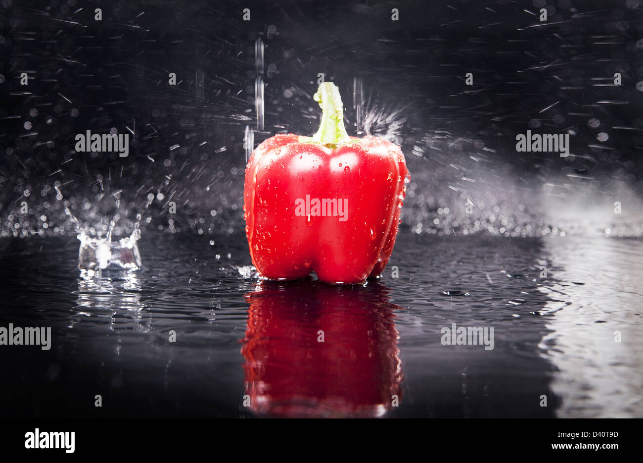 Photo of fresh red paprika over the water Stock Photo - Alamy