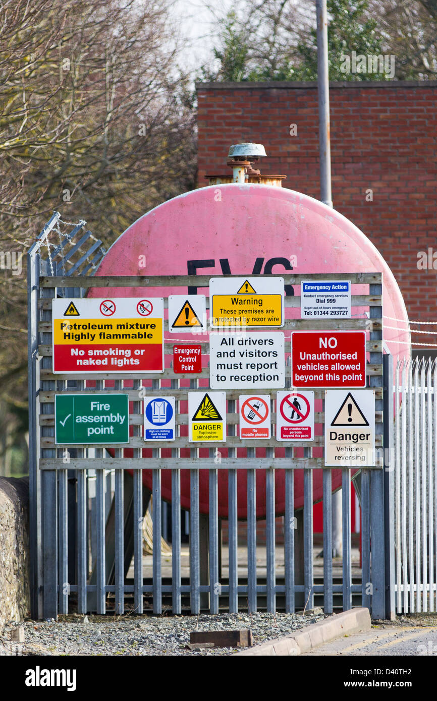 13 warning signs at gas depot Stock Photo - Alamy