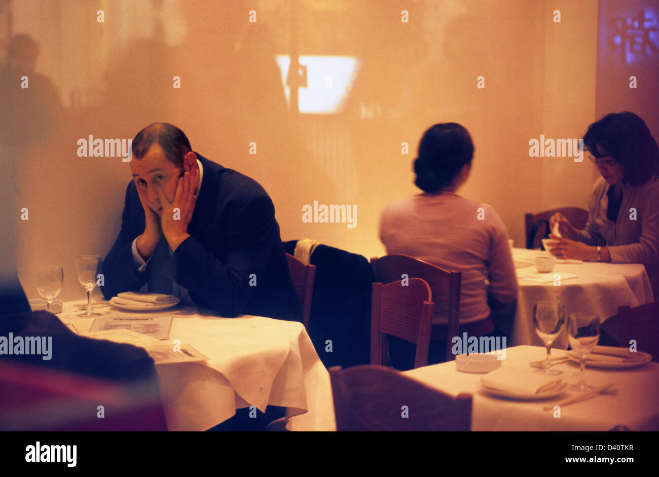 Waiting for food in a restaurant Stock Photo - Alamy