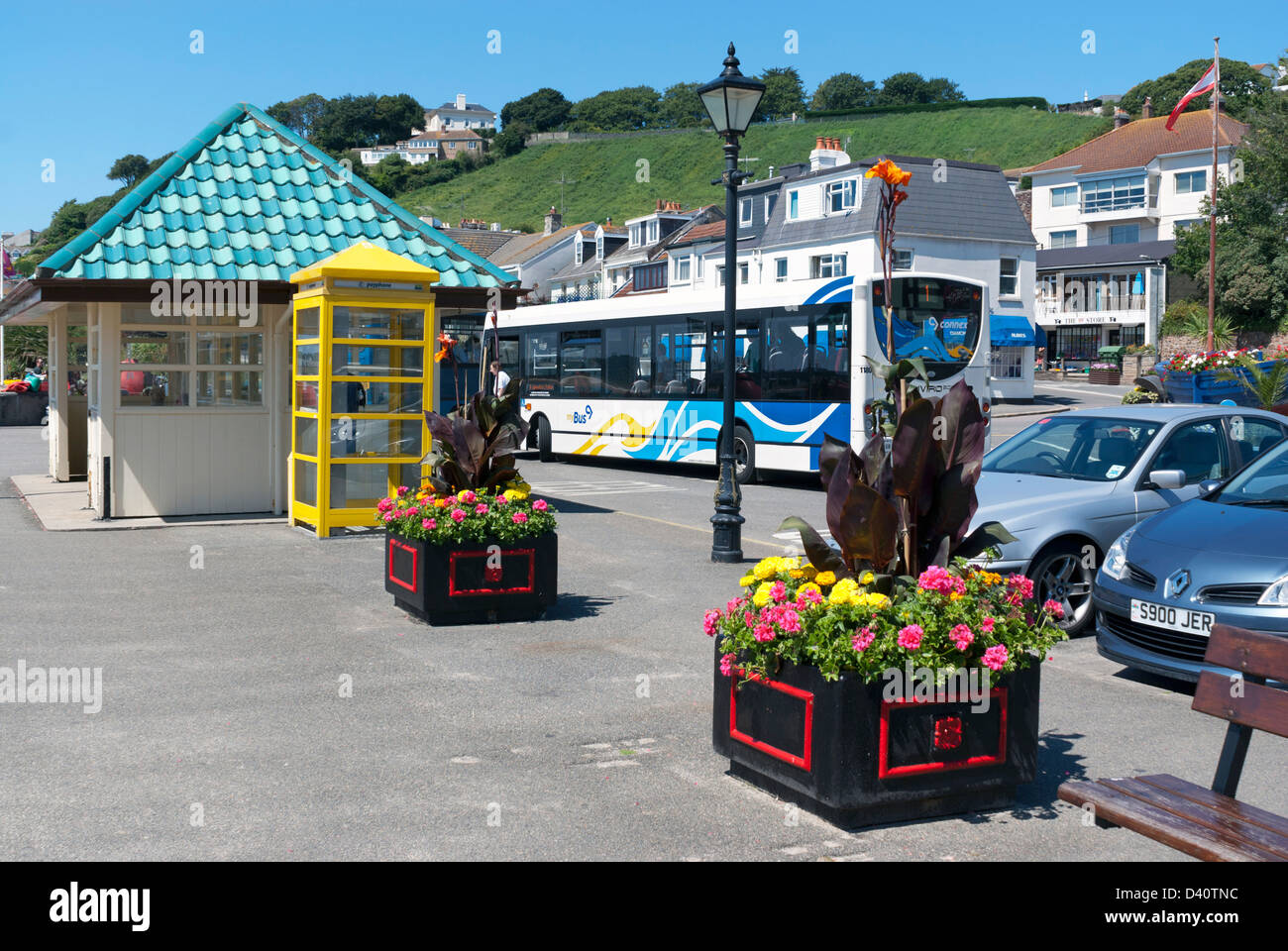 Bus shelter on the quayside in the village of Gorey, Jersey, Channel ...