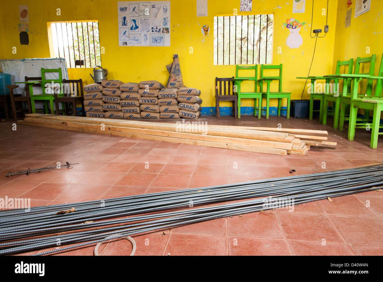 Rebar and other construction equipment on the floor of rural classroom ...