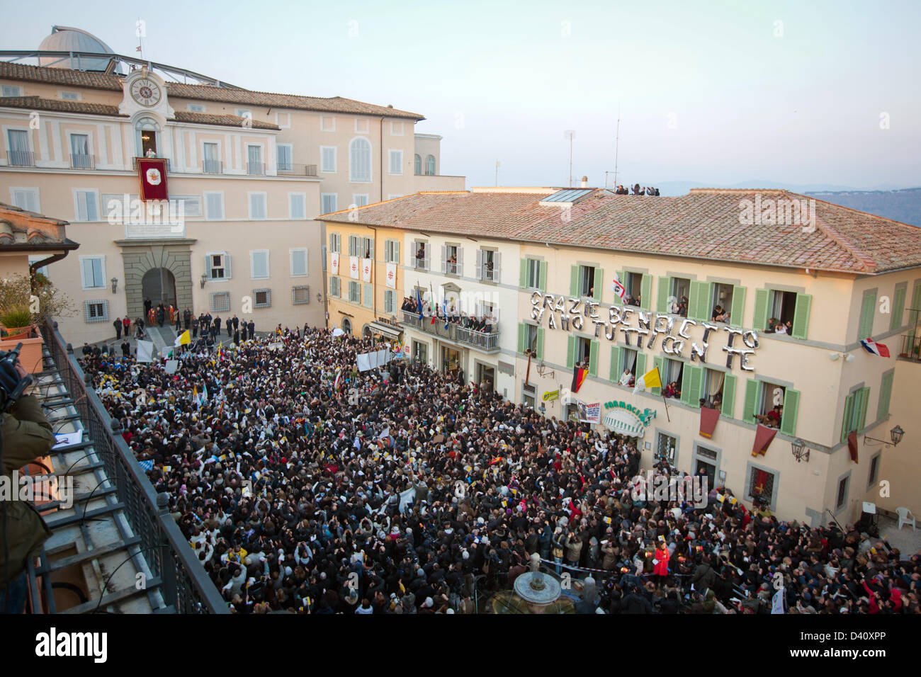 Pope Benedict XVI stands on the balcony of the Apostolic Palace and ...