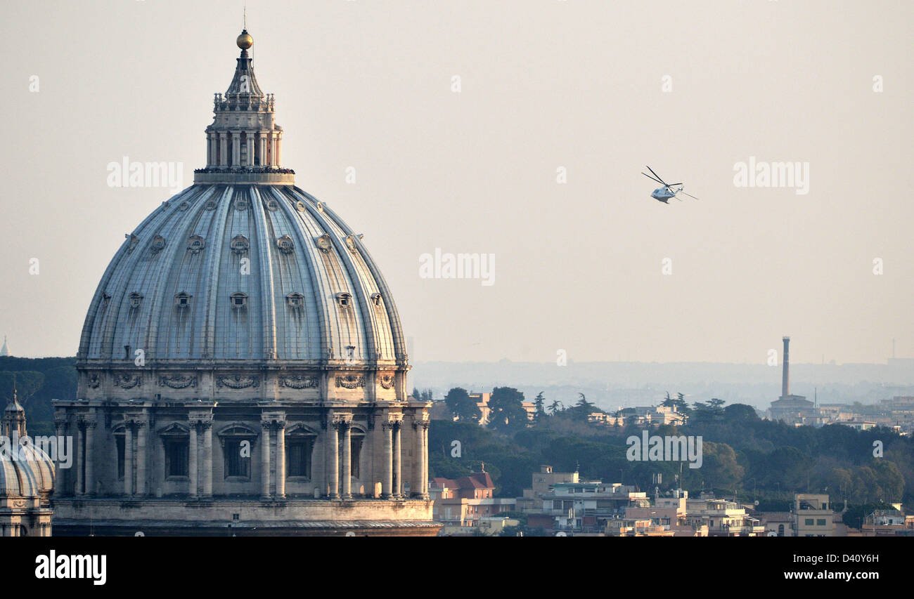 The helicopter carrying Pope Benedict XVI flies past St. Peter's ...