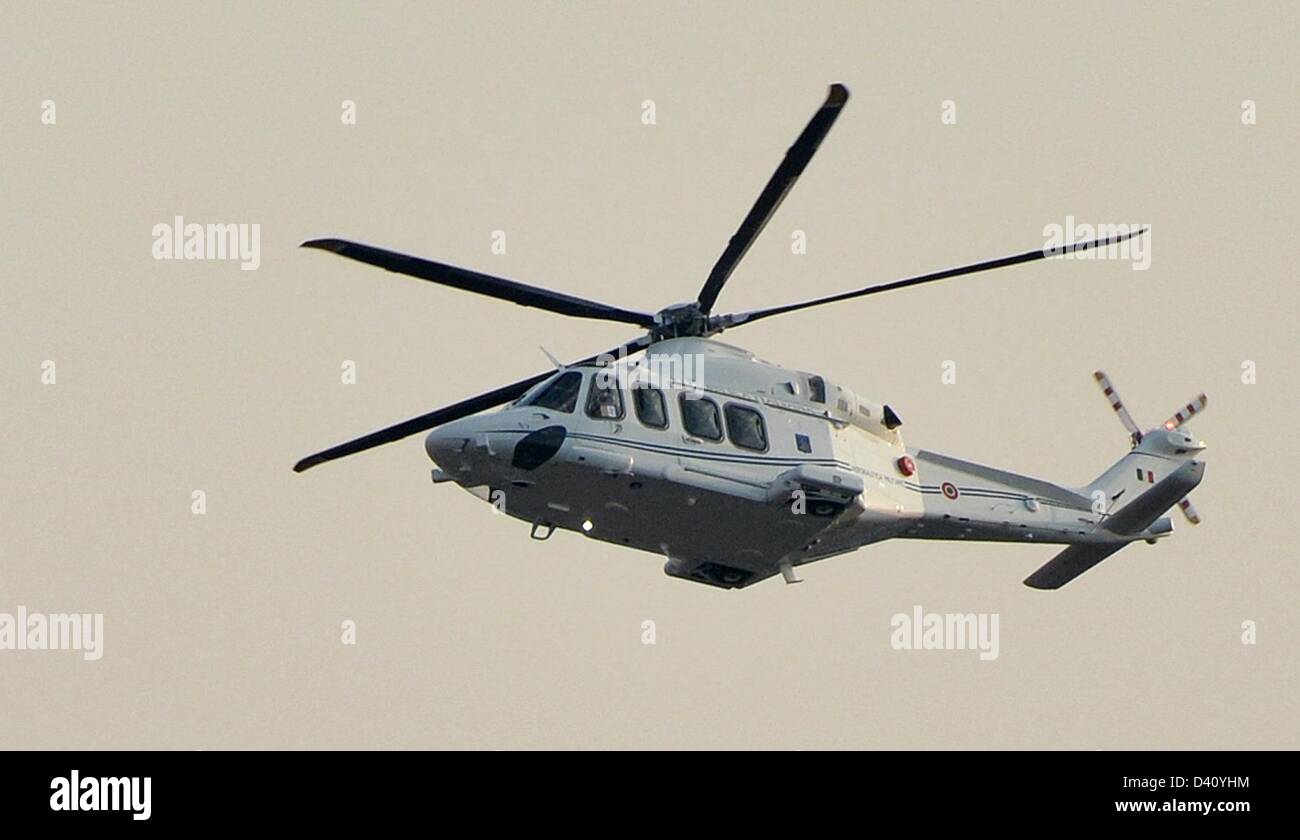 The helicopter carrying Pope Benedict XVI flies past St. Peter's ...