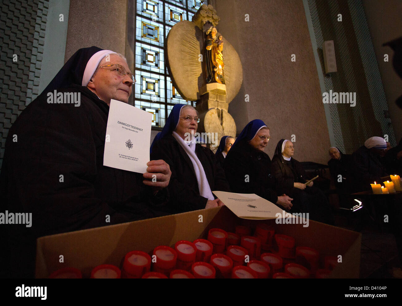 Nuns wait for the start of the thanksgiving mass for Pope Benedict XVI ...