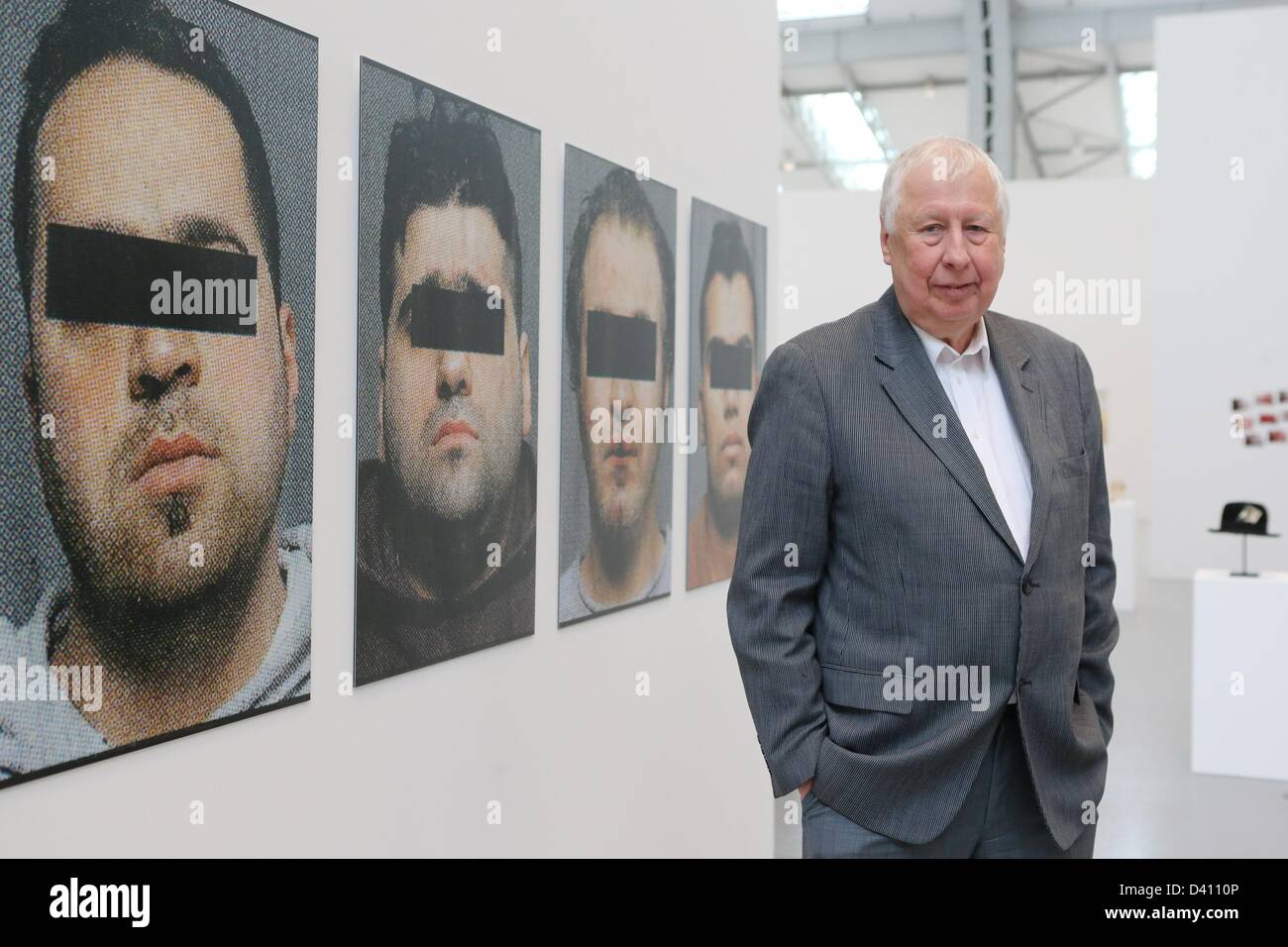Artist Hans Peter Feldmann poses next to one of his artworks during a ...
