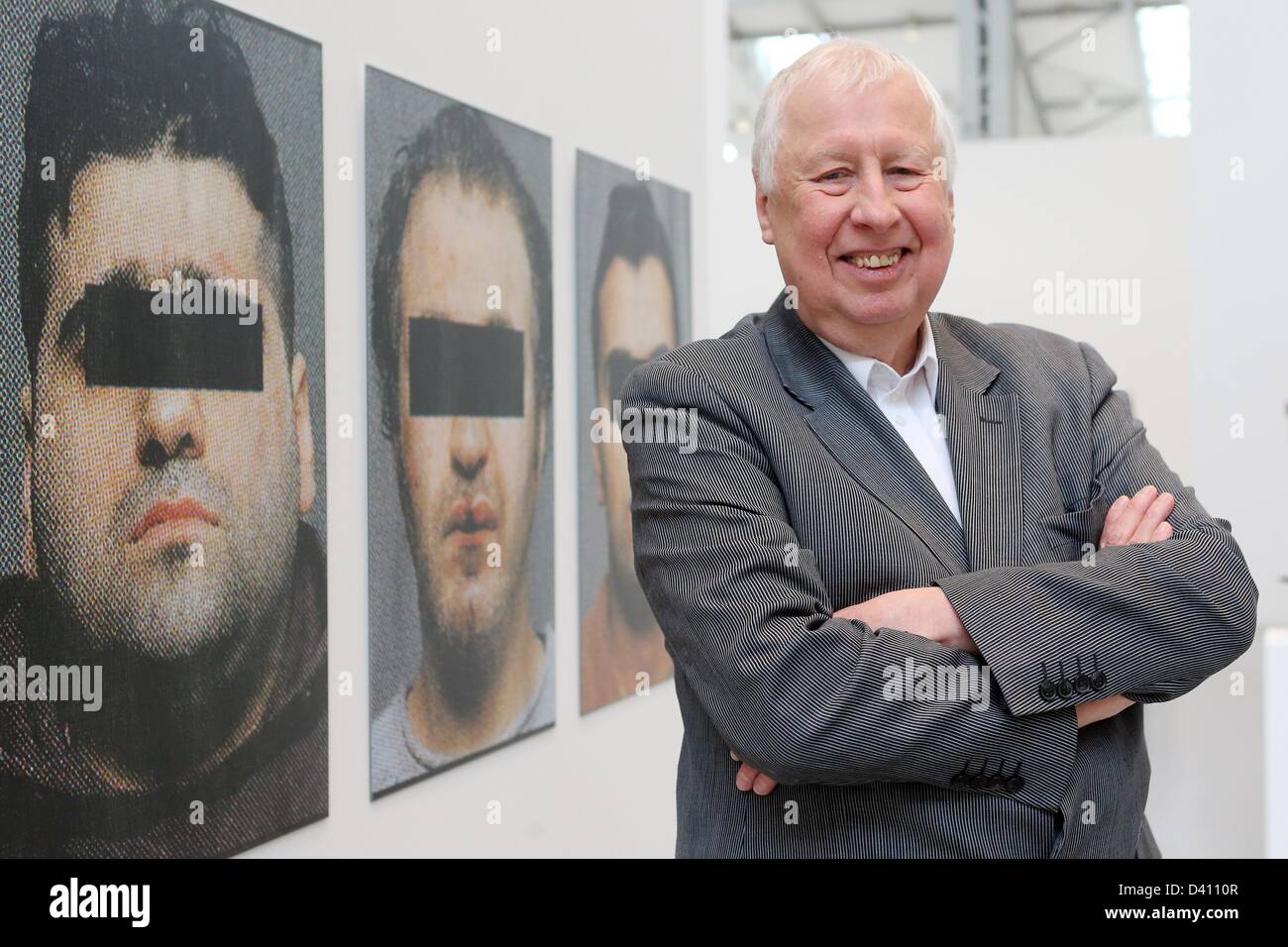 Artist Hans Peter Feldmann poses next to one of his artworks during a ...