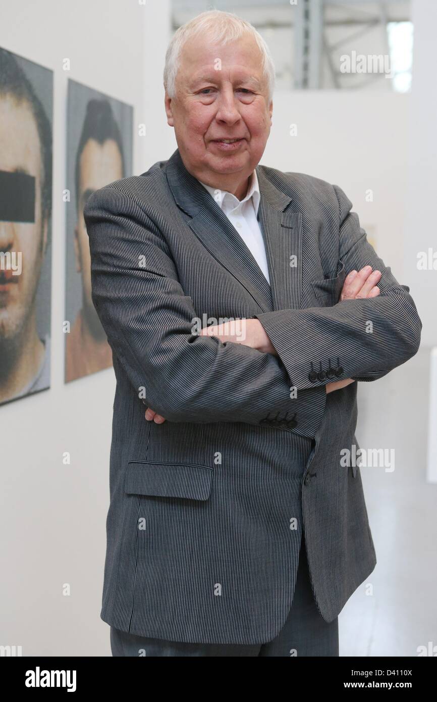 Artist Hans Peter Feldmann poses next to one of his artworks during a ...