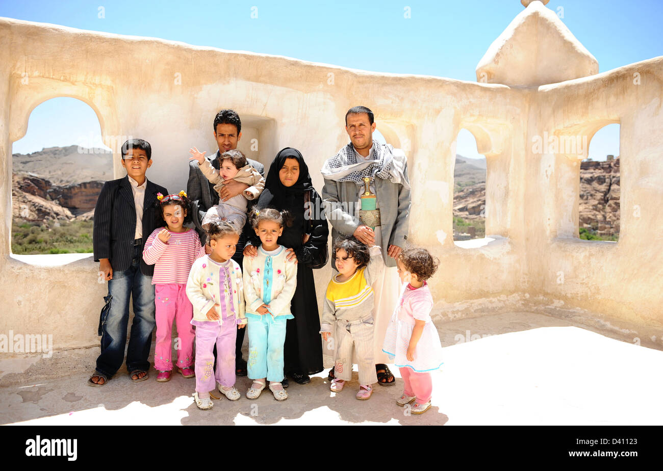 Local family group visiting the 1930's palace of Dar al-Hajar 15km ...