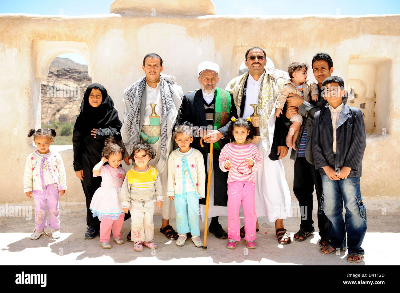 Local family group visiting the 1930's palace of Dar al-Hajar 15km ...