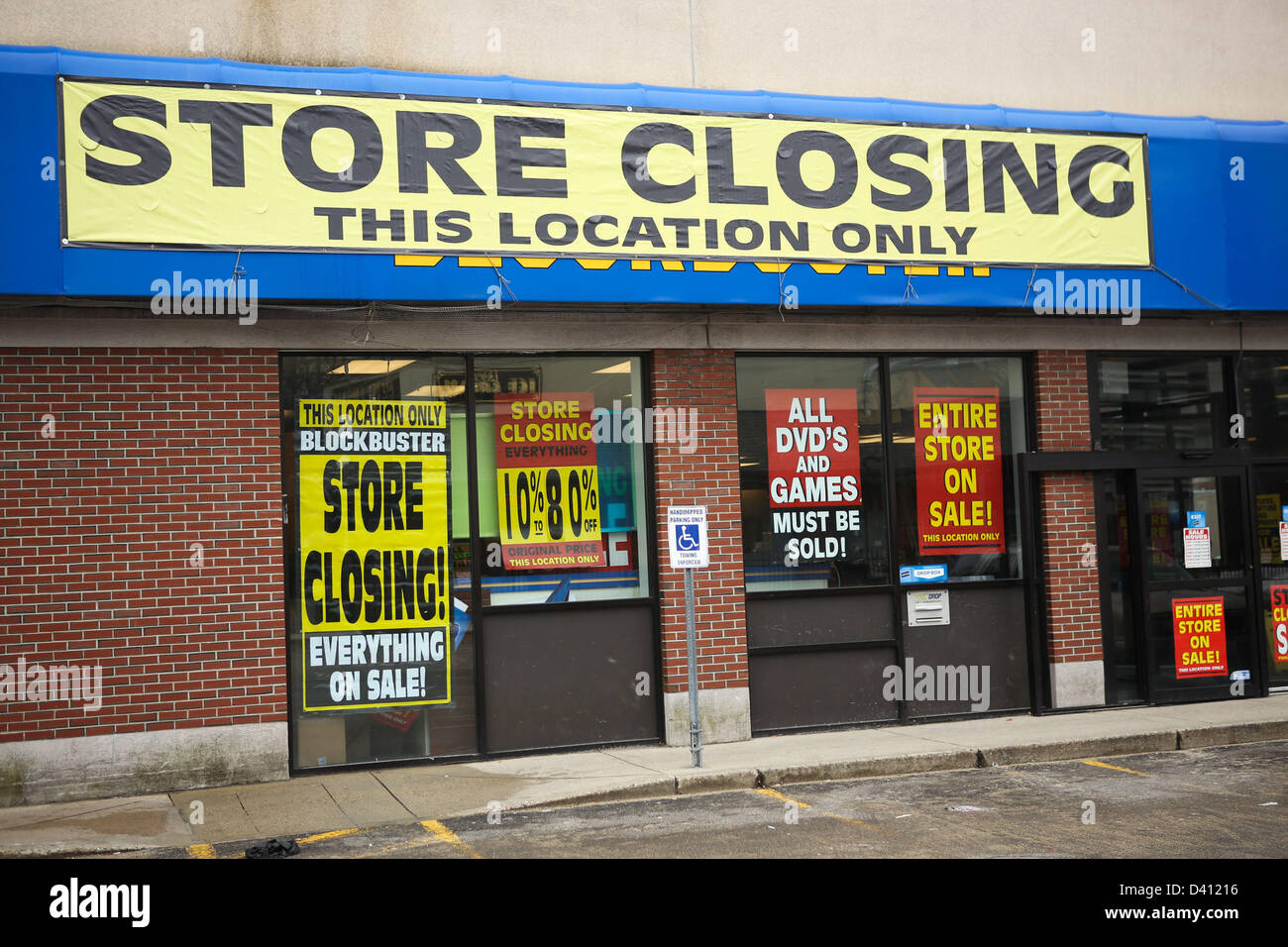 Malden, Massachusetts, U.S. Feb. 28, 2013. Store closing signs on a ...