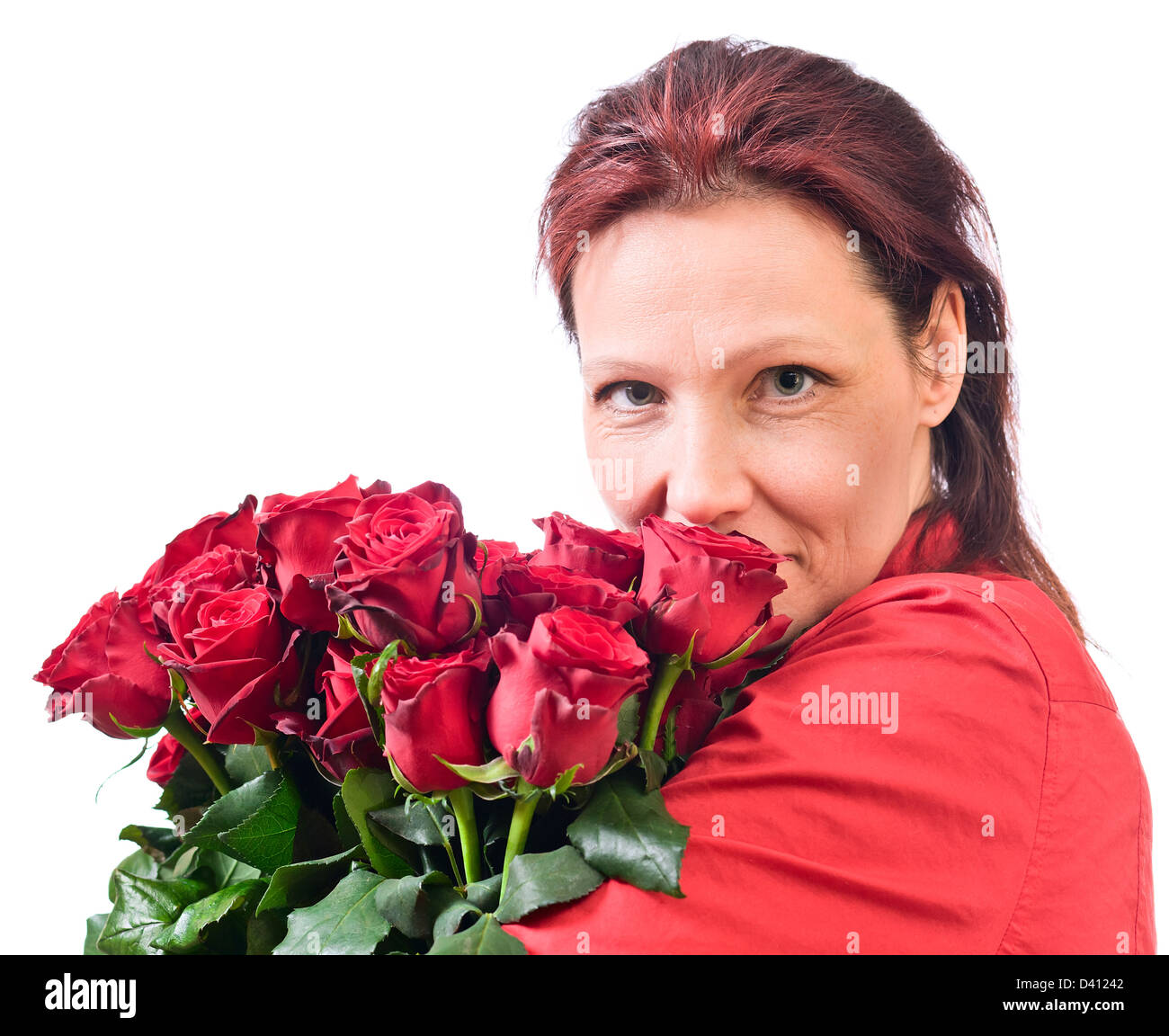 The woman of middle age with a bouquet of red roses Stock Photo - Alamy